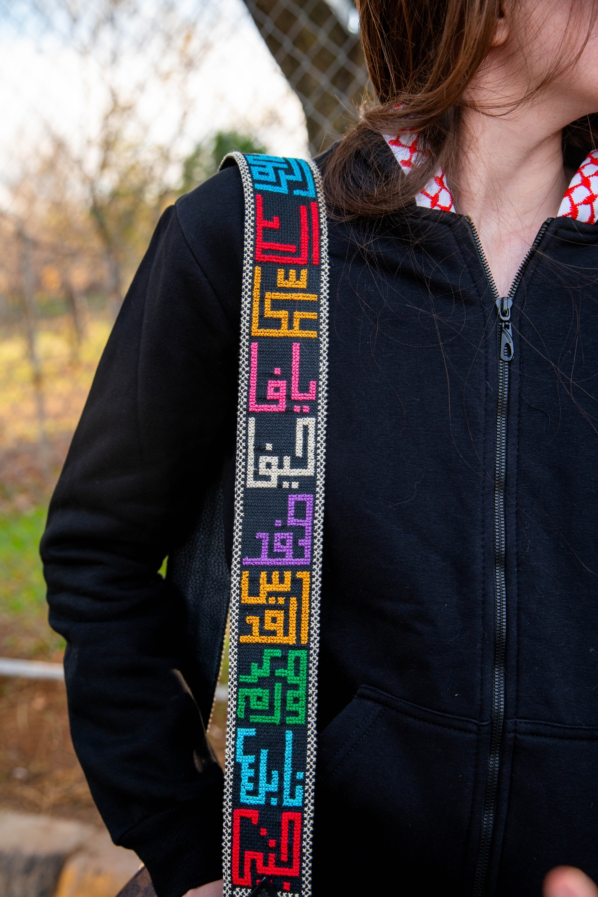 Hand-Embroidered Black Bag Strap with Palestinian City Names Design ...
